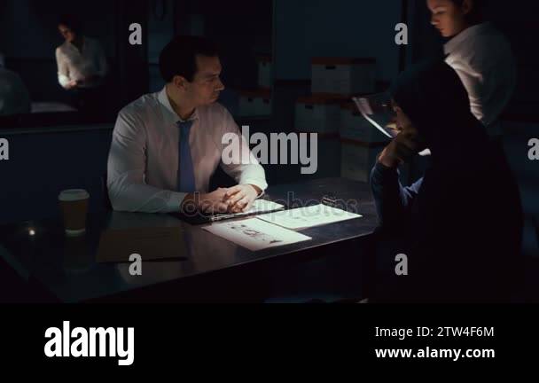 4K Police detective in interview room interrogating a suspect Stock ...