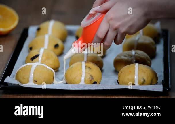 Raw unbaked buns. Ready to bake homemade Easter traditional hot cross ...
