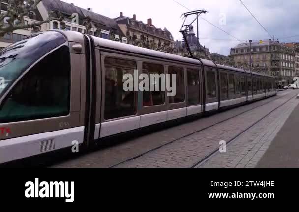 Two tram transportation meet each other going in different directions ...