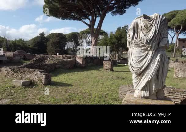 Pan right at Roman necropolis of Ostia Antica at Rome with a beautiful ...