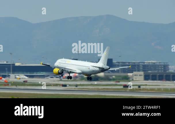 Commercial airliner landing at Barcelona International Airport.Airbus ...