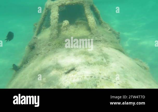 UNDERWATER CLOSE UP: Algae covered military airplane deteriorates in ...