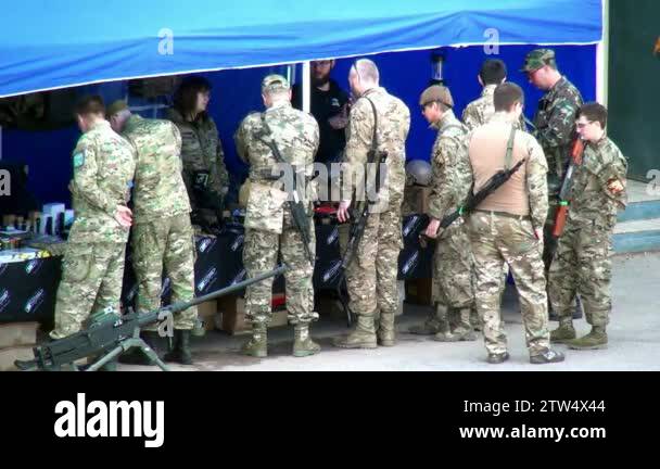 Squad of strikeball team with machine submachine guns Stock Video ...