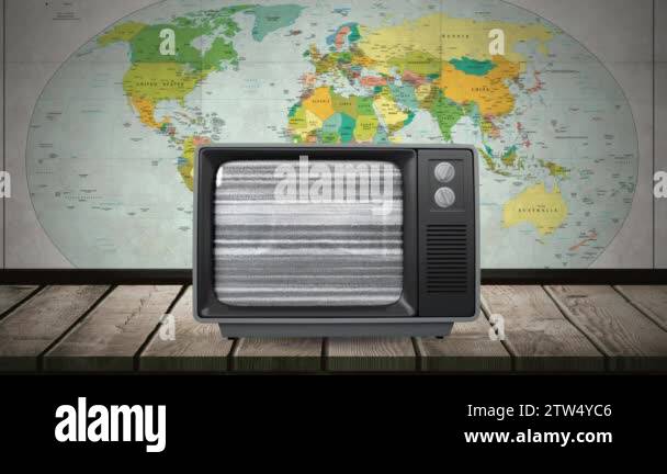 Digital animation of a television on top of a wooden plank table with a ...