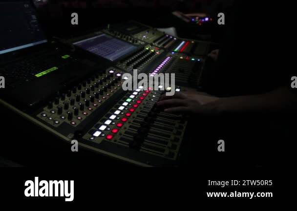remote recordists closeup. Hand adjusts sound effects. Electric machine ...
