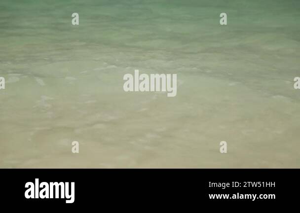 Abstract water background. Slow motion looping clean water ripples and ...