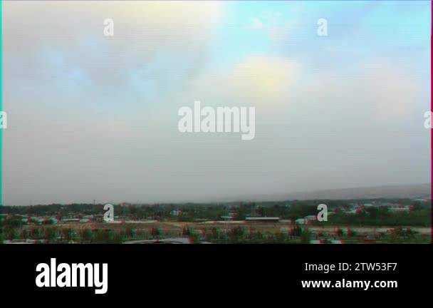 Glitch effect. Rain clouds in the morning in the dry Dushanbe ...