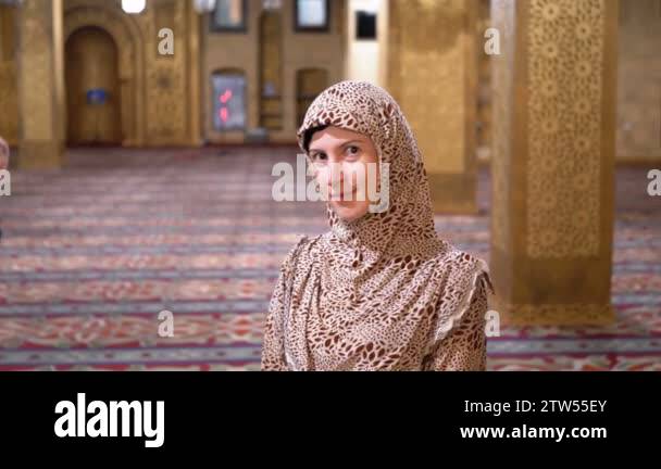 Woman Dressed in a Nuns Robe Stands Inside an Islamic Temple. Egypt ...