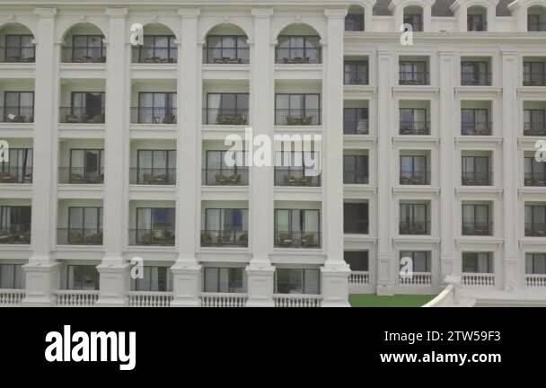 Facade luxury resort hotel with balcony view from flying drone. Outdoor ...