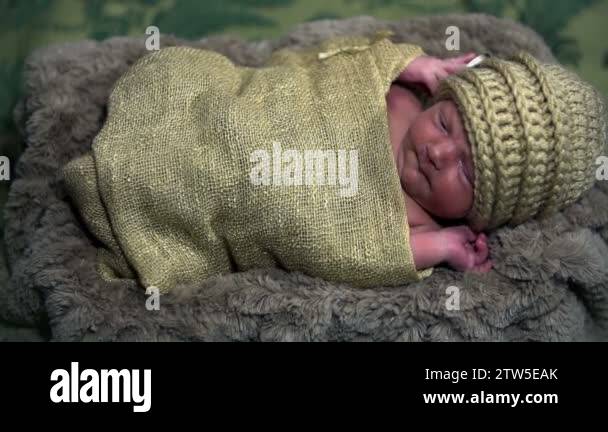 Baby in a sack Stock Videos & Footage - HD and 4K Video Clips - Alamy