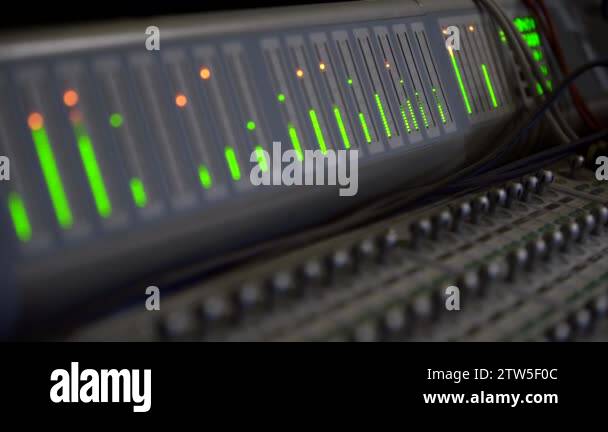 Large mixing console in the recording Studio, close-up of the equalizer ...