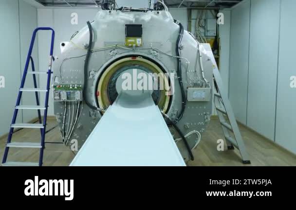 New hospital room improvement with tomograph being installed. An empty ...