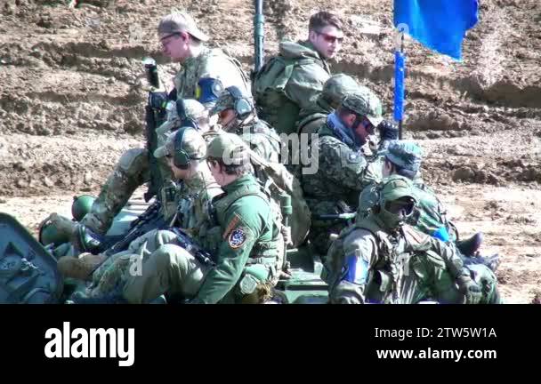 Squad of strikeball team with machine submachine guns on panze Stock ...