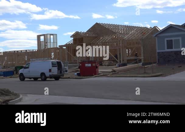 Construction Workers Building House 4K features a static shot of ...