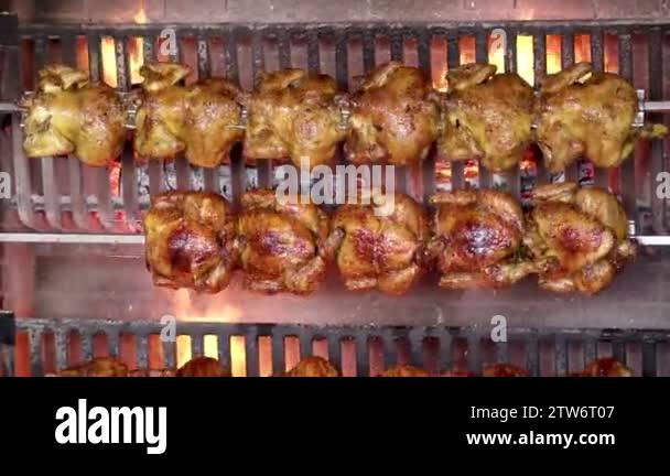 Rotisserie chicken grill rotating over Stock Videos & Footage - HD and ...