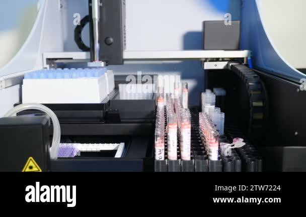 Laboratory analysis and diagnostic machine. Robotic manipulator arms ...