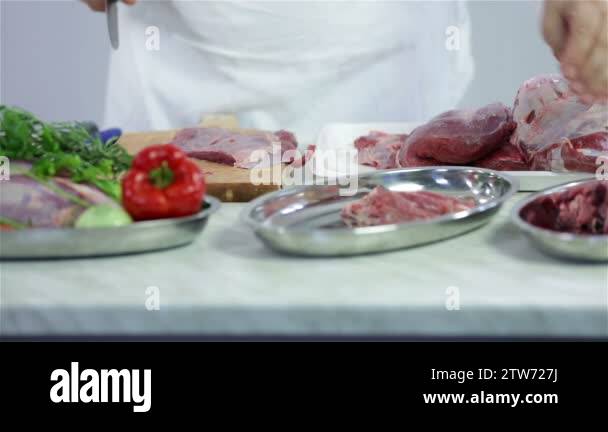 Butcher cutting red meat small Stock Videos & Footage - HD and 4K Video ...