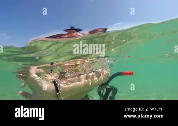 Beautiful young teenage girl and mother woman have fun hugging each ...