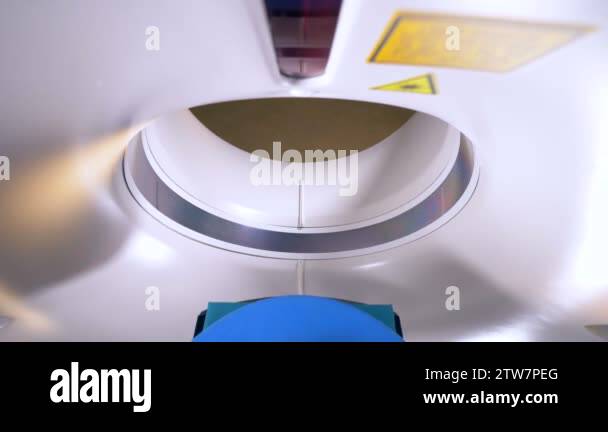 Hospital emergency MRI image scan. Woman lays in Magnetic Resonance ...