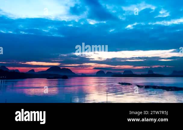 Sunrise at a small fishing village in southern Thailand. Time lapse 4k ...