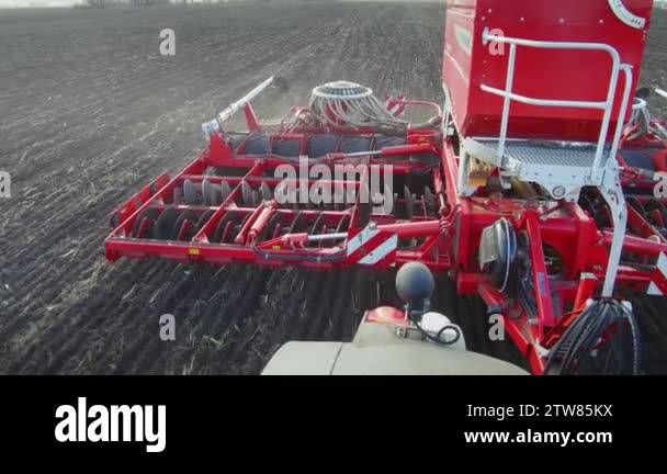 Element of a modern sowing machine.. Spring work in the field and ...