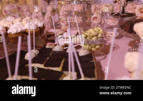 Candy bar in the restaurant, childrens party, a white teddy bear with a ...