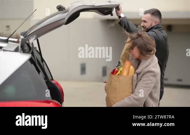 Smiling man loading groceries Stock Videos & Footage - HD and 4K Video ...
