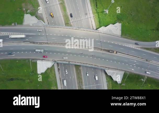 Elevated expressway. Clip. Top view at curves and lines of city highway ...