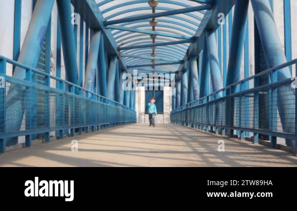 Boy on bridge Stock Videos & Footage - HD and 4K Video Clips - Alamy