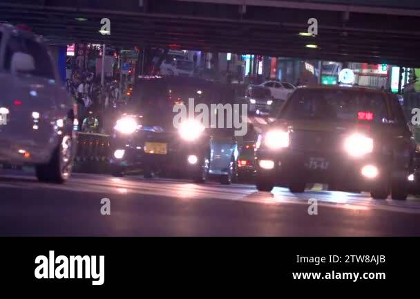 Traffic crosses the famous intersection in Shibuya, Tokyo, Japan Stock ...