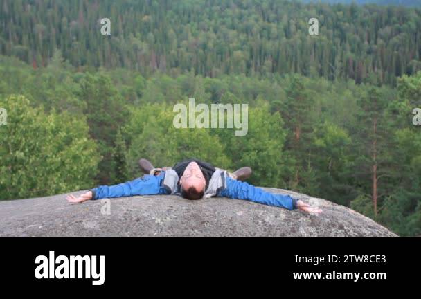 Man sleeping on rock Stock Videos & Footage - HD and 4K Video Clips - Alamy