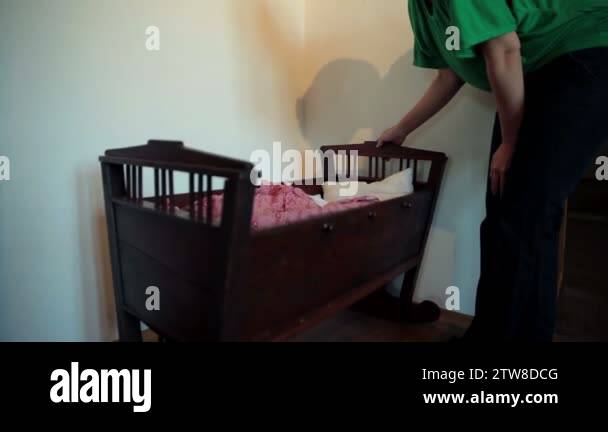 Woman rocking a cradle Stock Videos & Footage - HD and 4K Video Clips ...
