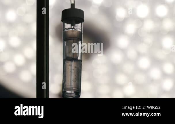 Modern drop counter with falling dribs of saline in an intensive ...