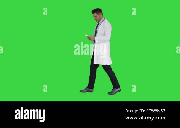 Doctor presenting nasal spray or some other medicine on a Green Screen ...