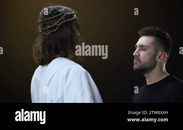 Jesus in thorns crown comforting crying man, peace in soul, God ...