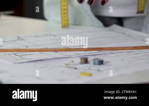 Creative female drawing with ruler on patterns close up, inspiration ...