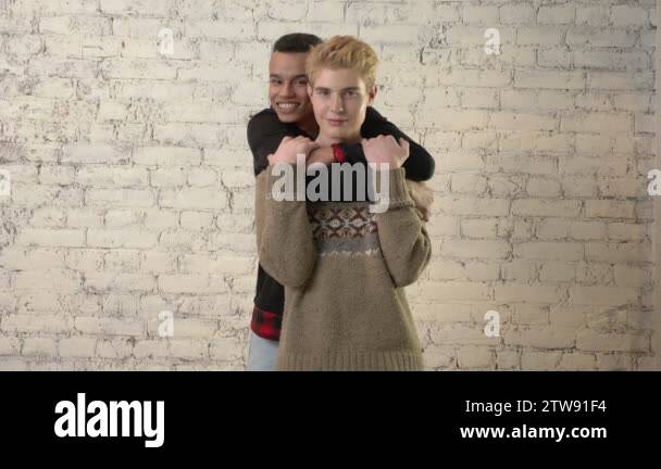 Happy african boy hugging his beloved. Happy gay couple, lgbt family ...