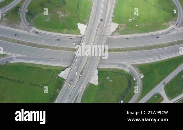 Elevated expressway. Clip. Top view at curves and lines of city highway ...