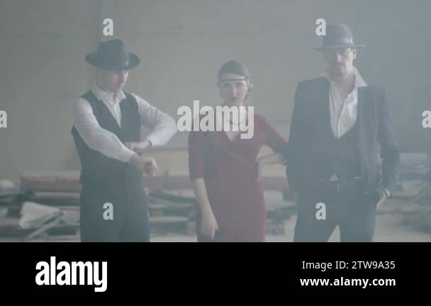 Portrait two confident well-dressed men standing in two sides of a ...