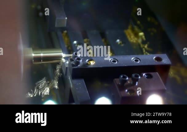 Metalworking milling machine. Produces fine gold detail in a factory ...