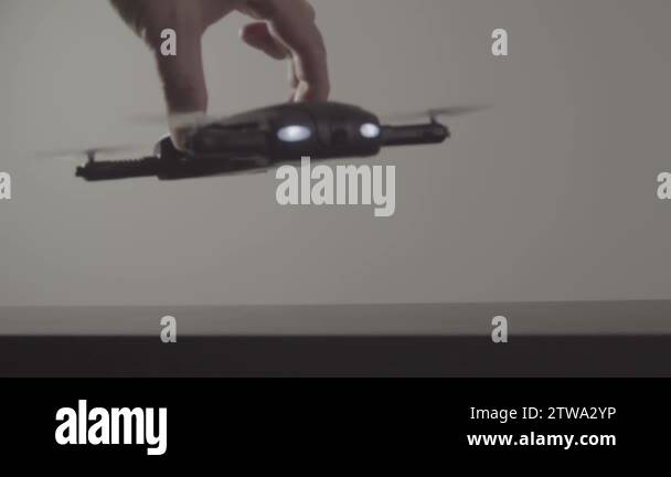 Futuristic transportation concept.Micro drone take off from laptop ...