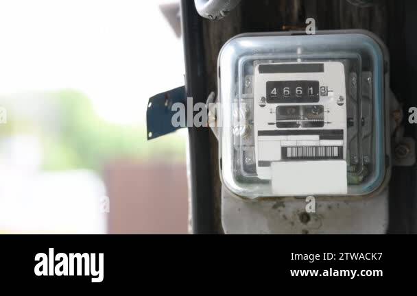 Electricity meter installed on concrete poles are rotated according to ...