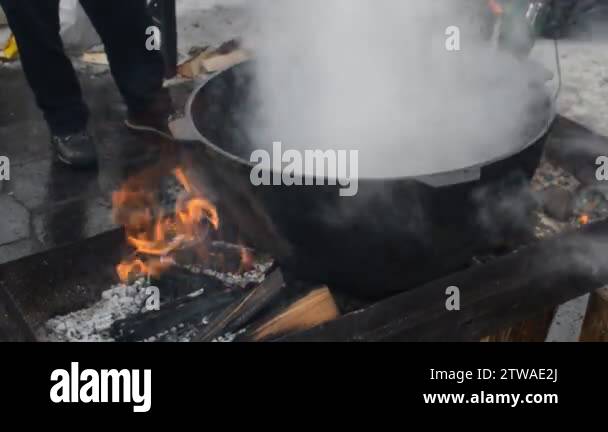 frying pan fire street pilaf, on the street prepare food for feeding ...