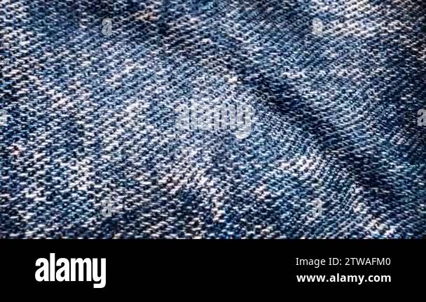 Denim fabric textured blue fluttering. Animated movement of the canvas ...