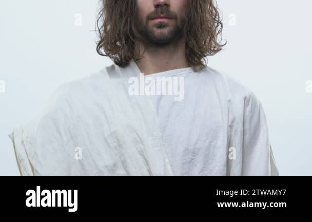 Jesus Christ reaching out peace of bread to hungry people, alms ...