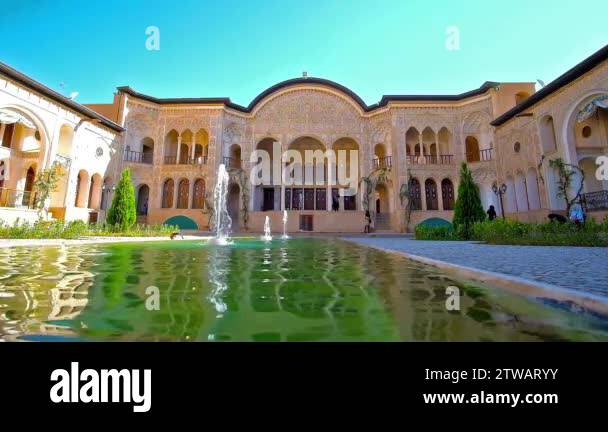 KASHAN, IRAN - OCTOBER 22, 2017: The courtyard of picturesque Tabatabaei Historical House with ...