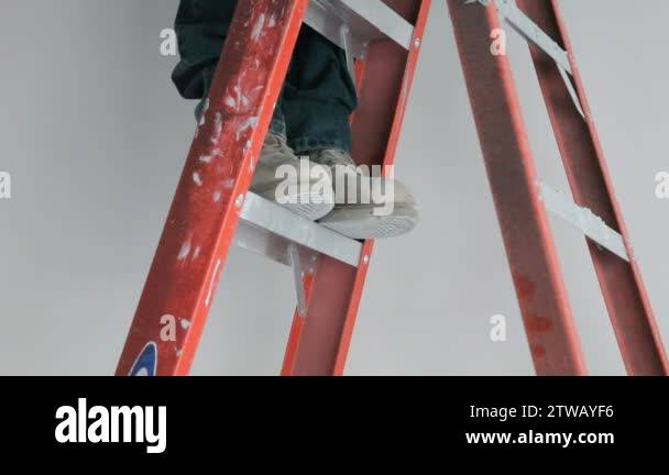 Man on ladder Stock Videos & Footage - HD and 4K Video Clips - Alamy