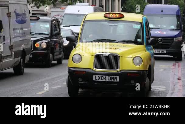 London, UK, May 31, 2019: Traditional Yellow British Taxi Cab LTI TXII ...