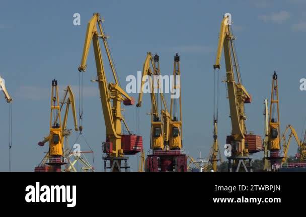 Synchronous operation of two port cranes to load the vessel Stock Video ...