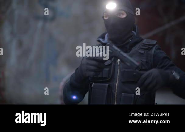 Special Police Forces. Men Wearing Tactical West and Black Mask with ...